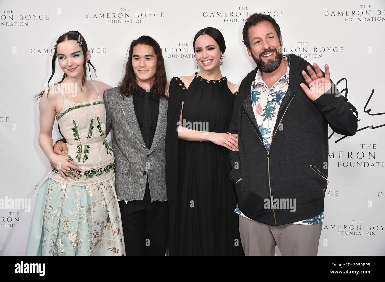 Dove Cameron, from left, Boo Boo Stewart, Sofia Carson and Adam Sandler ...