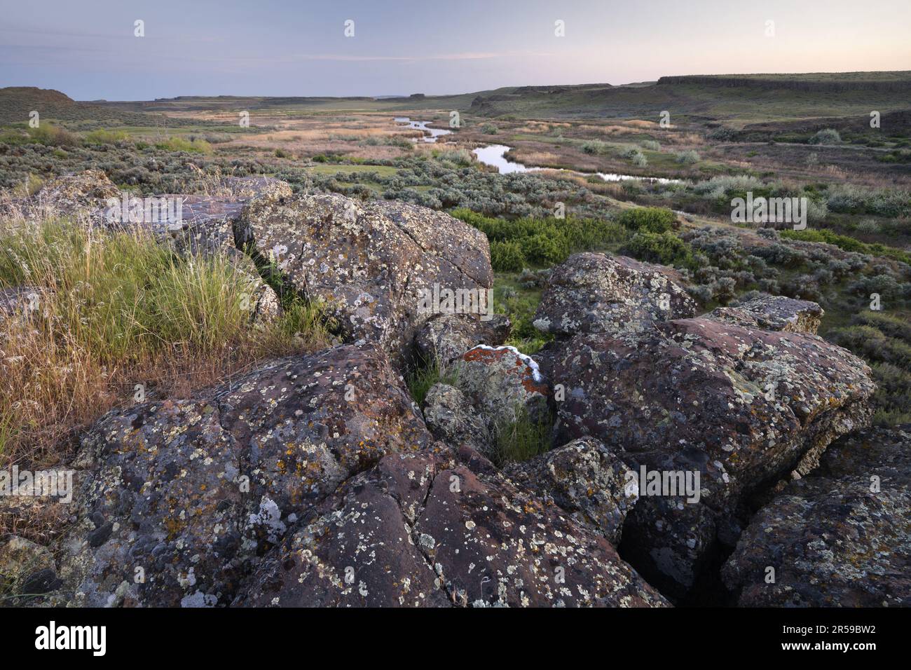 Lower Crab Creek flowing through channeled scablands at dusk, Columbia ...