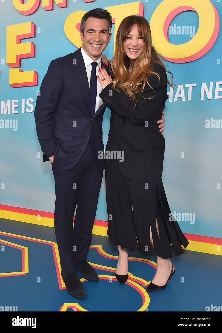 Chris Messina, left, and Kaley Cuoco arrive at the Los Angeles premiere ...