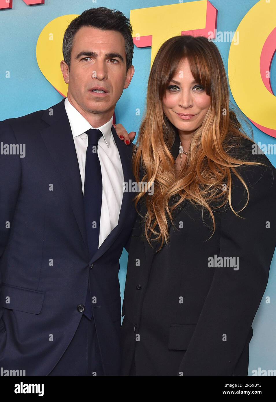 Chris Messina, left, and Kaley Cuoco arrive at the Los Angeles premiere ...