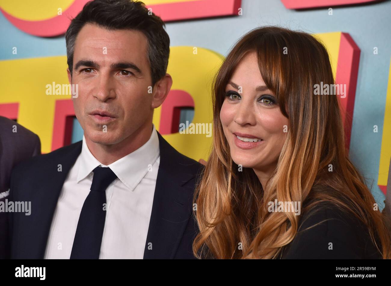 Chris Messina, left, and Kaley Cuoco arrive at the Los Angeles premiere ...