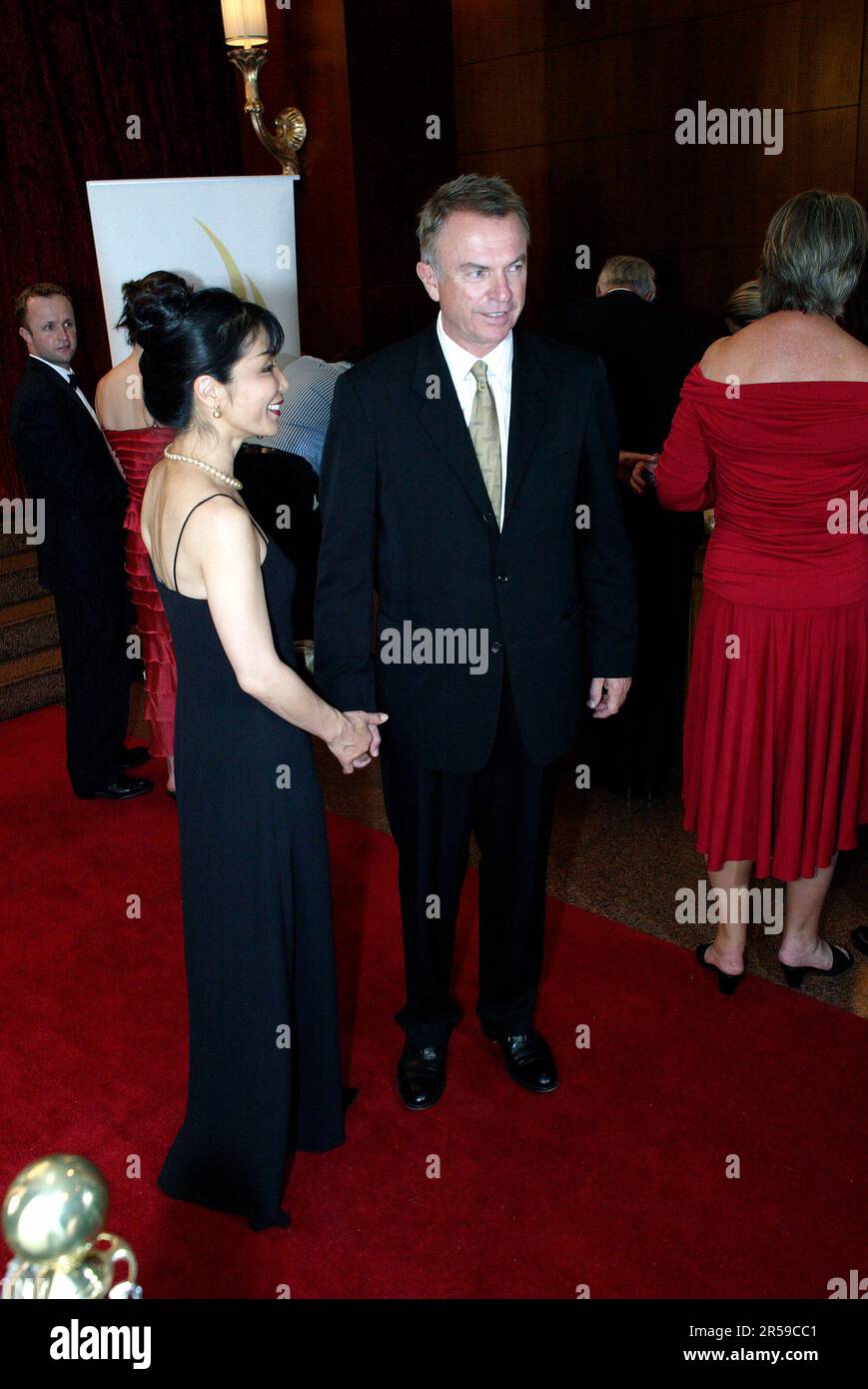 Sam Neill and his wife, Noriko Watanabe, at the Hollywood Nights ...