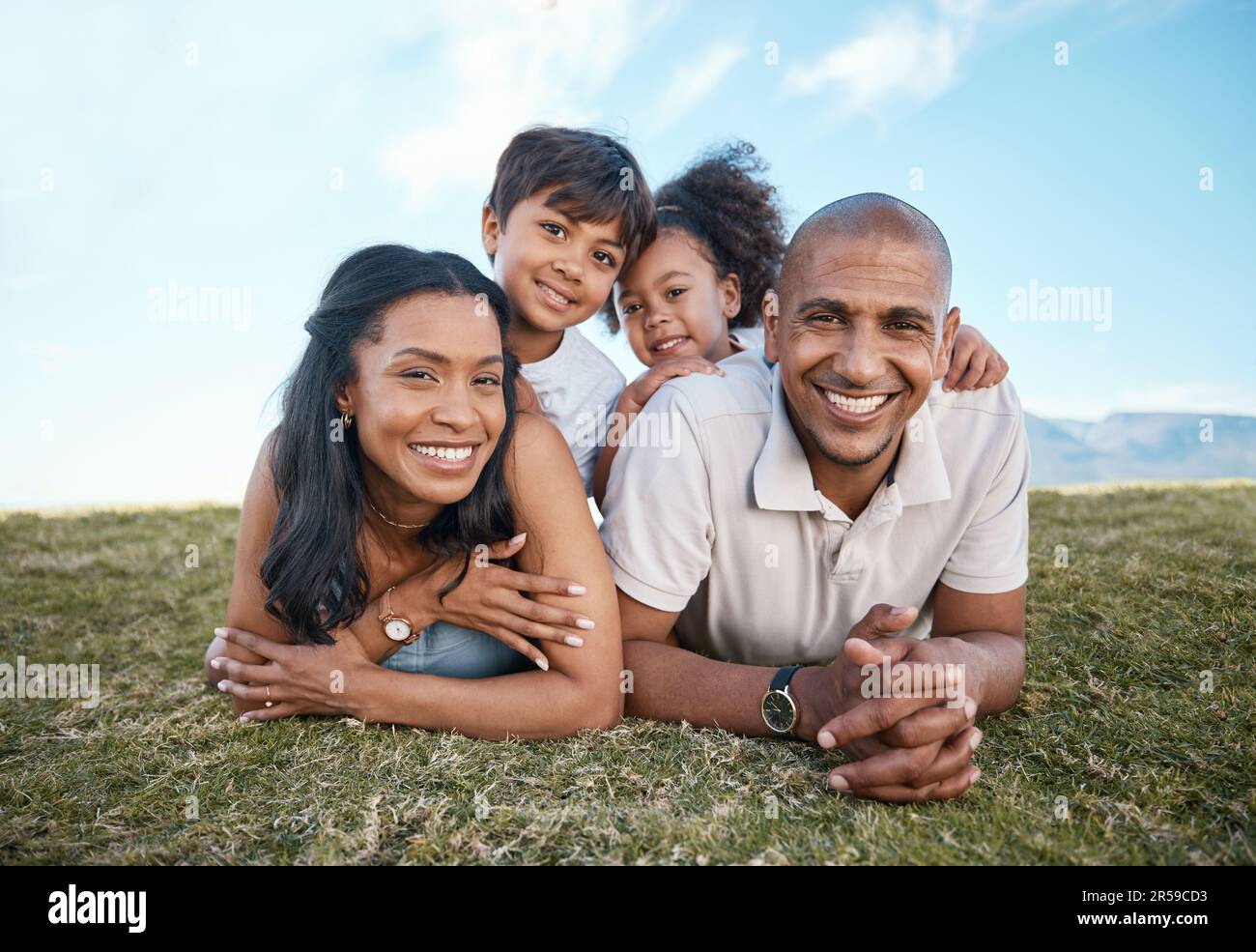 Family, portrait and relax parents in garden with mother, father and ...