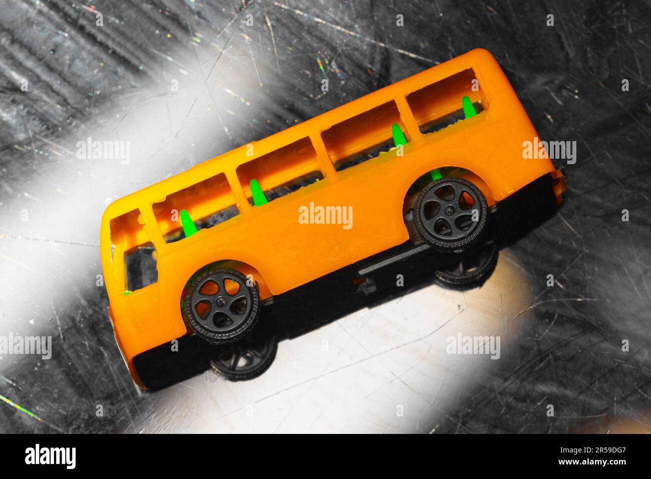 plastic model of a yellow school bus, showcasing a nostalgic ...