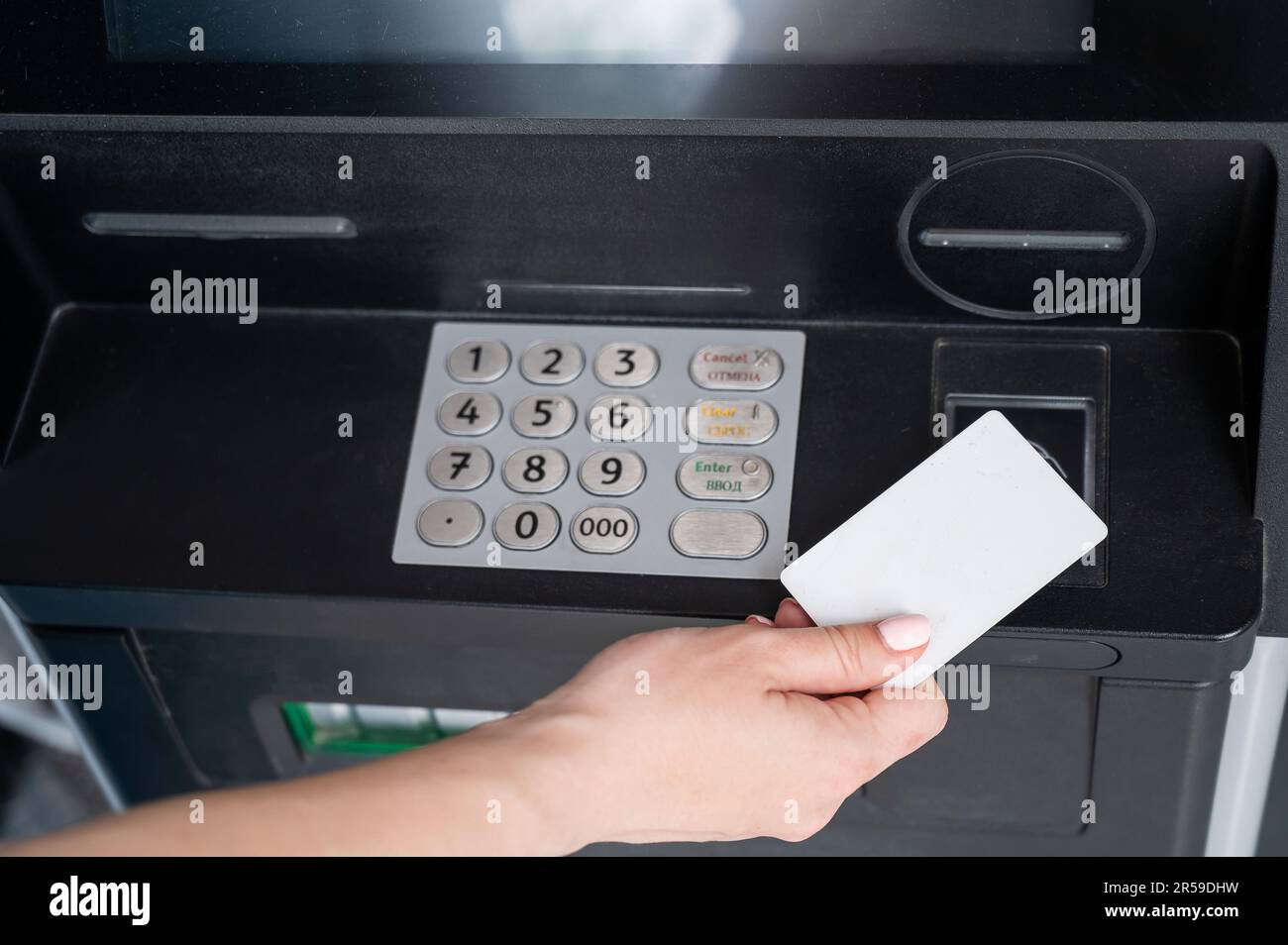 Close-up of woman's hands using ATM with contactless nfs access Stock ...