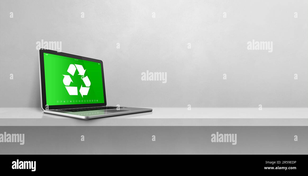 Laptop computer on a shelf with a recycling symbol on screen ...