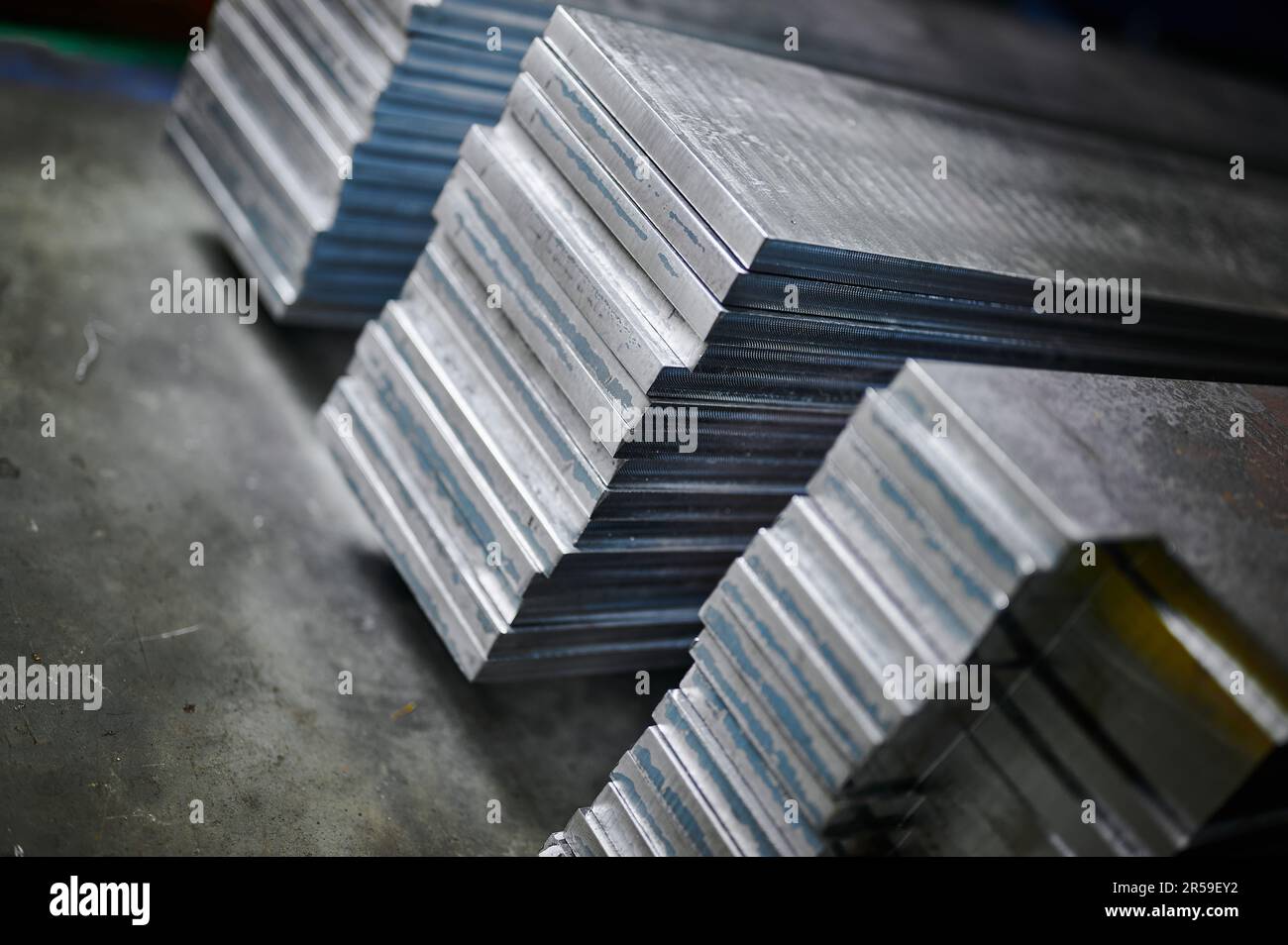 Steel details with ground edges and corners in storage Stock Photo - Alamy