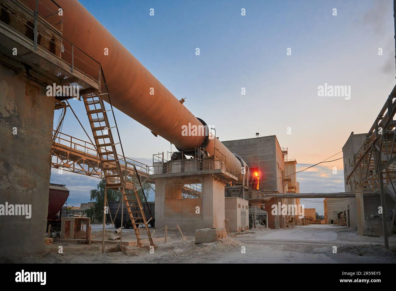 Long tubular rotary furnace roasts limestone at plant Stock Photo - Alamy