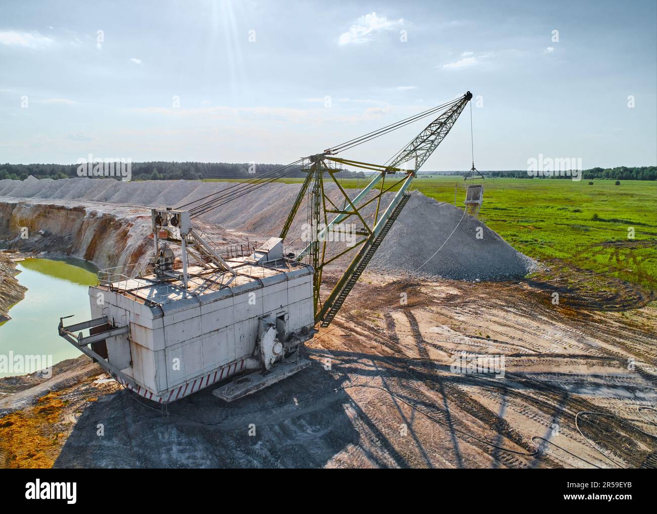 Old walking dragline with bucket operates in chalkquarry Stock Photo ...