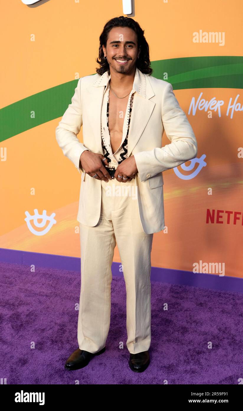 Michael Cimino poses at the season four premiere of the Netflix series ...