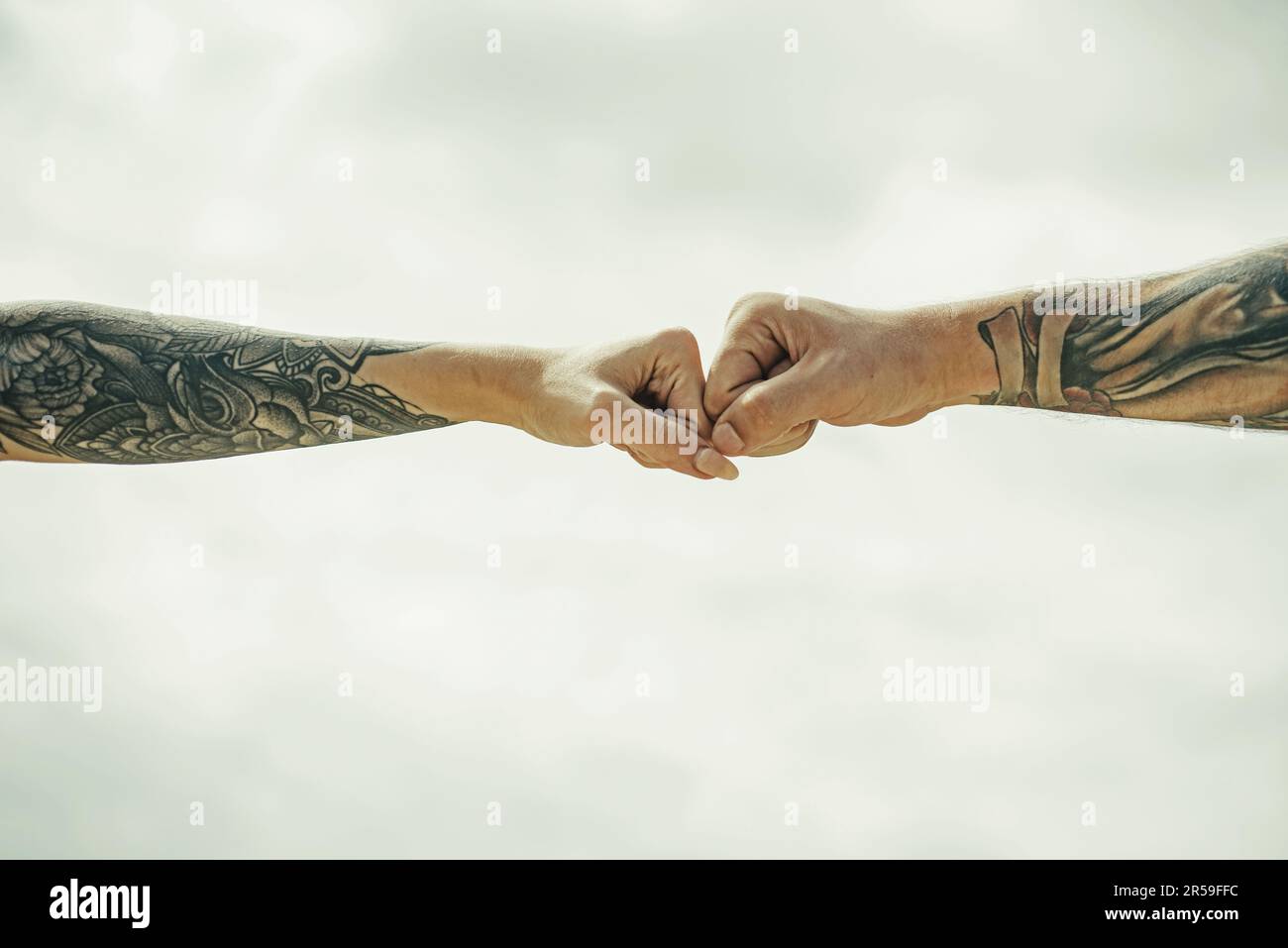 Couple hands with tattoo. Helping hand. Holding hand, close up. Giving ...