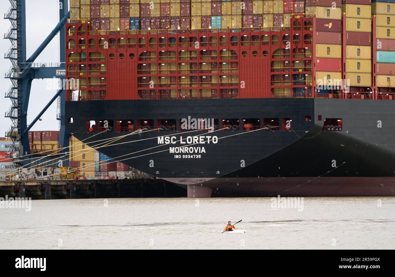 A man in a kayak is dwarfed by the world???s largest cargo ship, MSC ...