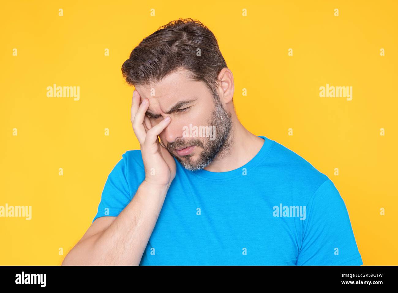 Thinking concept. Portrait of focused smart and creative man, holding ...