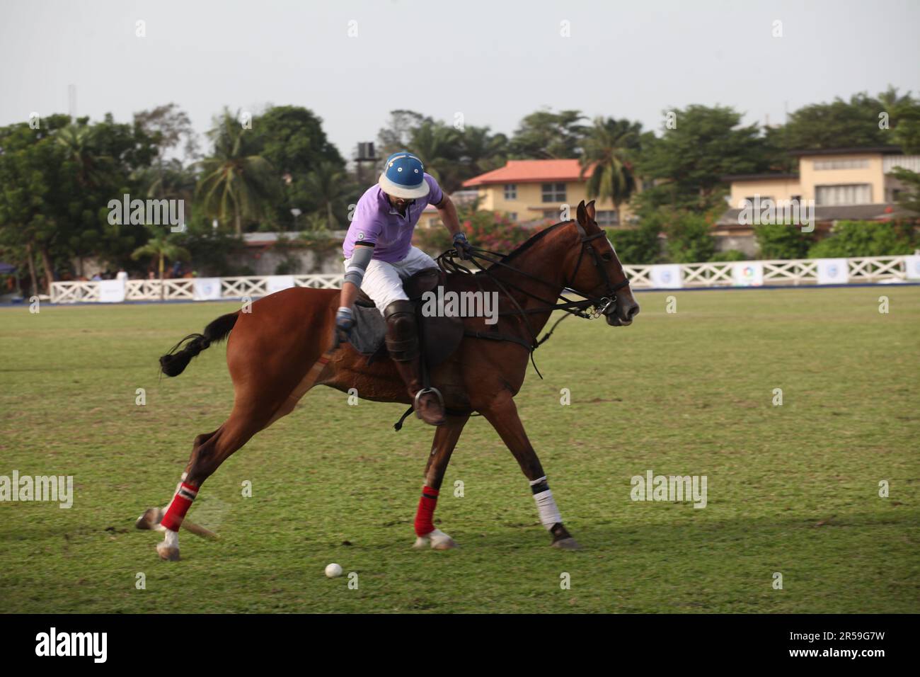 Polo players compete for the ball during the Ladies Polo invitation ...