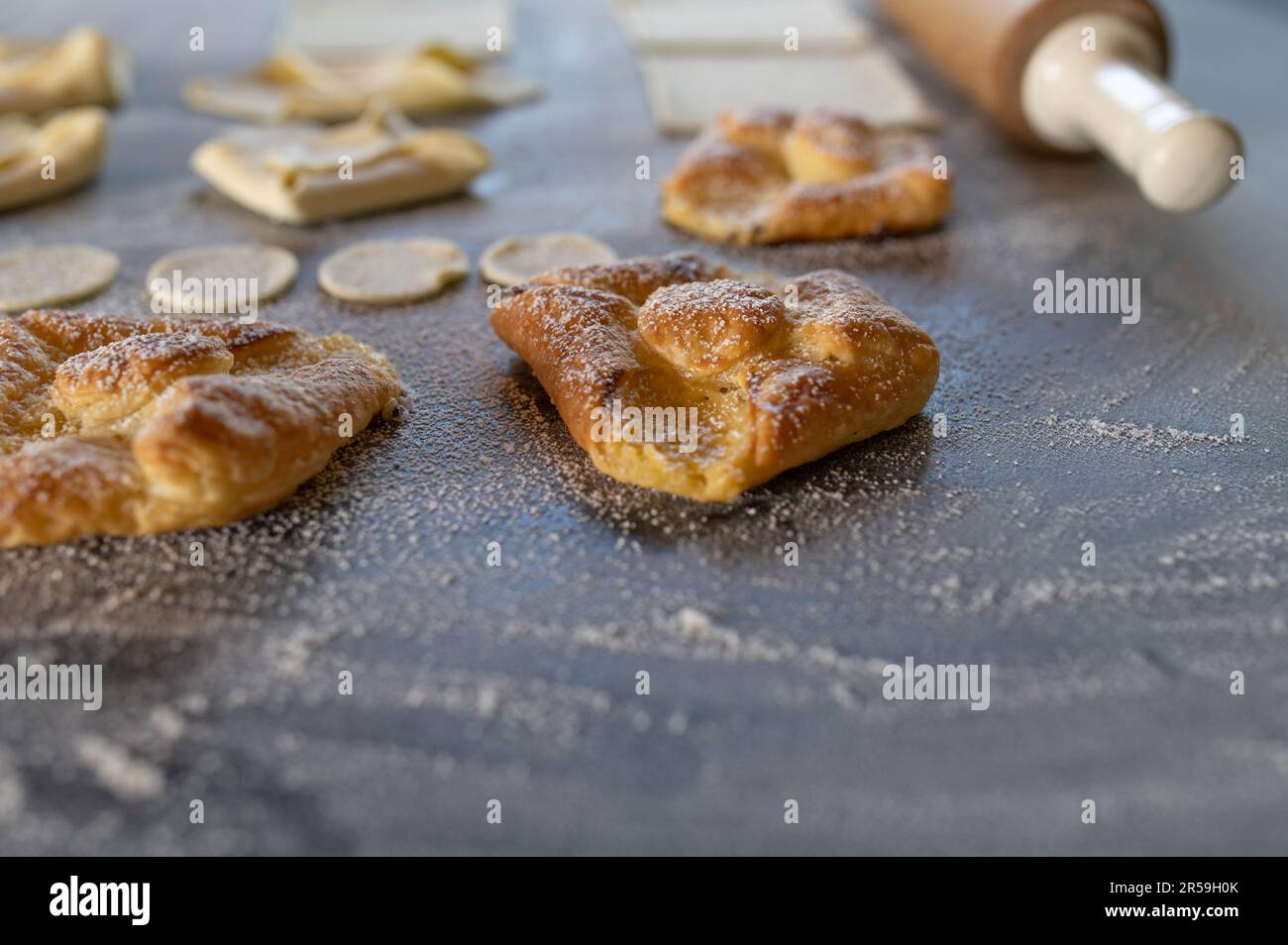 Baked and unbaked puff pastry. Baking preparation Stock Photo - Alamy