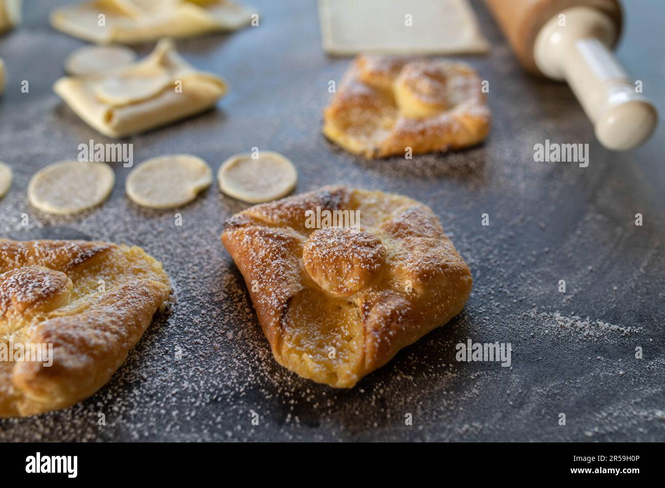 Baked and unbaked puff pastry. Baking preparation Stock Photo - Alamy