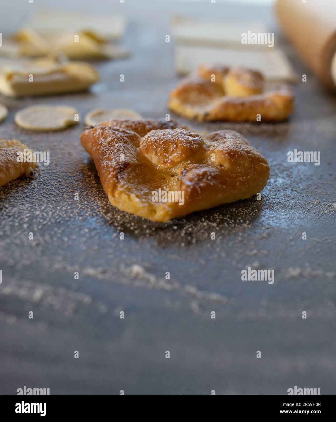 Baked and unbaked puff pastry. Baking preparation Stock Photo - Alamy