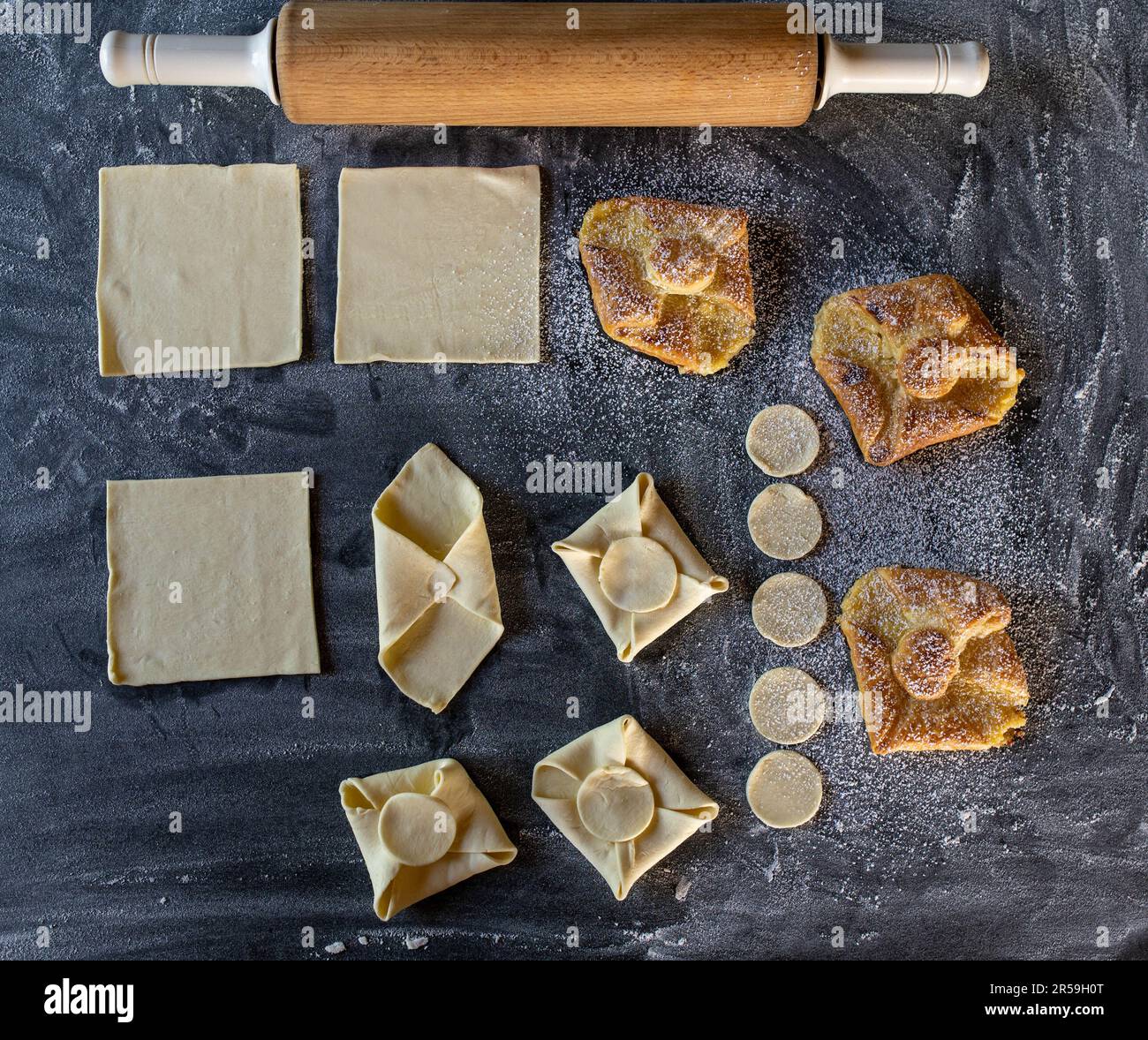 Baked and unbaked puff pastry with rolling pin on dark background for ...