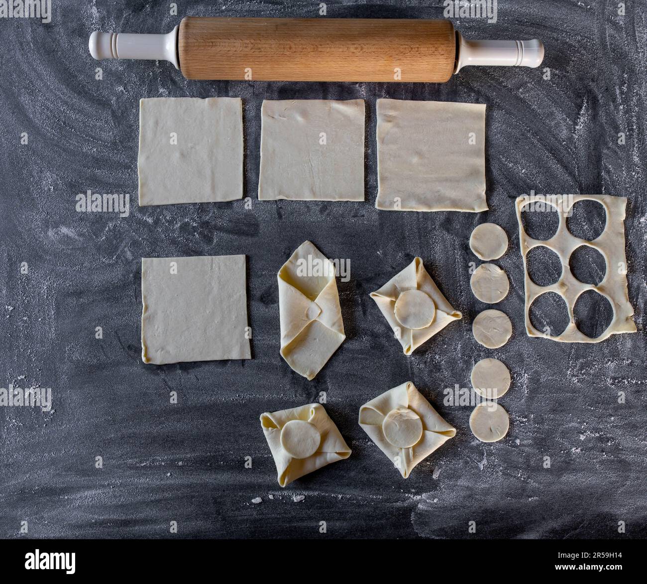 Shaping raw puff pastry dough Stock Photo - Alamy