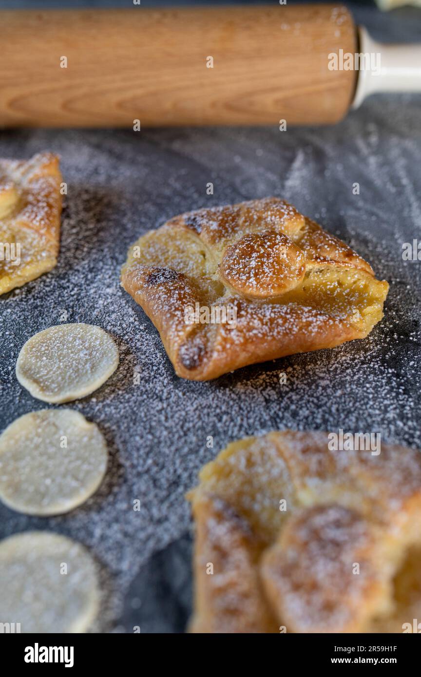 Baked and unbaked puff pastry. Baking preparation Stock Photo - Alamy