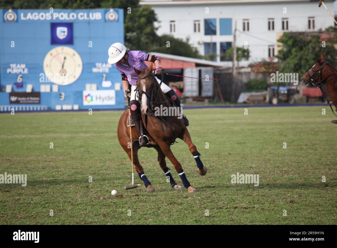 Polo players compete for the ball during the Ladies Polo invitation ...