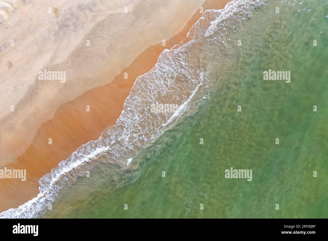 Aerial top view on tropical beach sea under sunlight Drone view in Goa ...