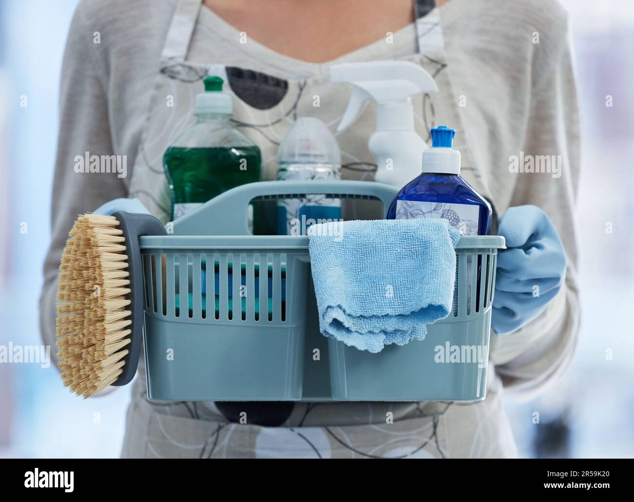 Hands, basket and product for cleaning home with brush, cloth or ...