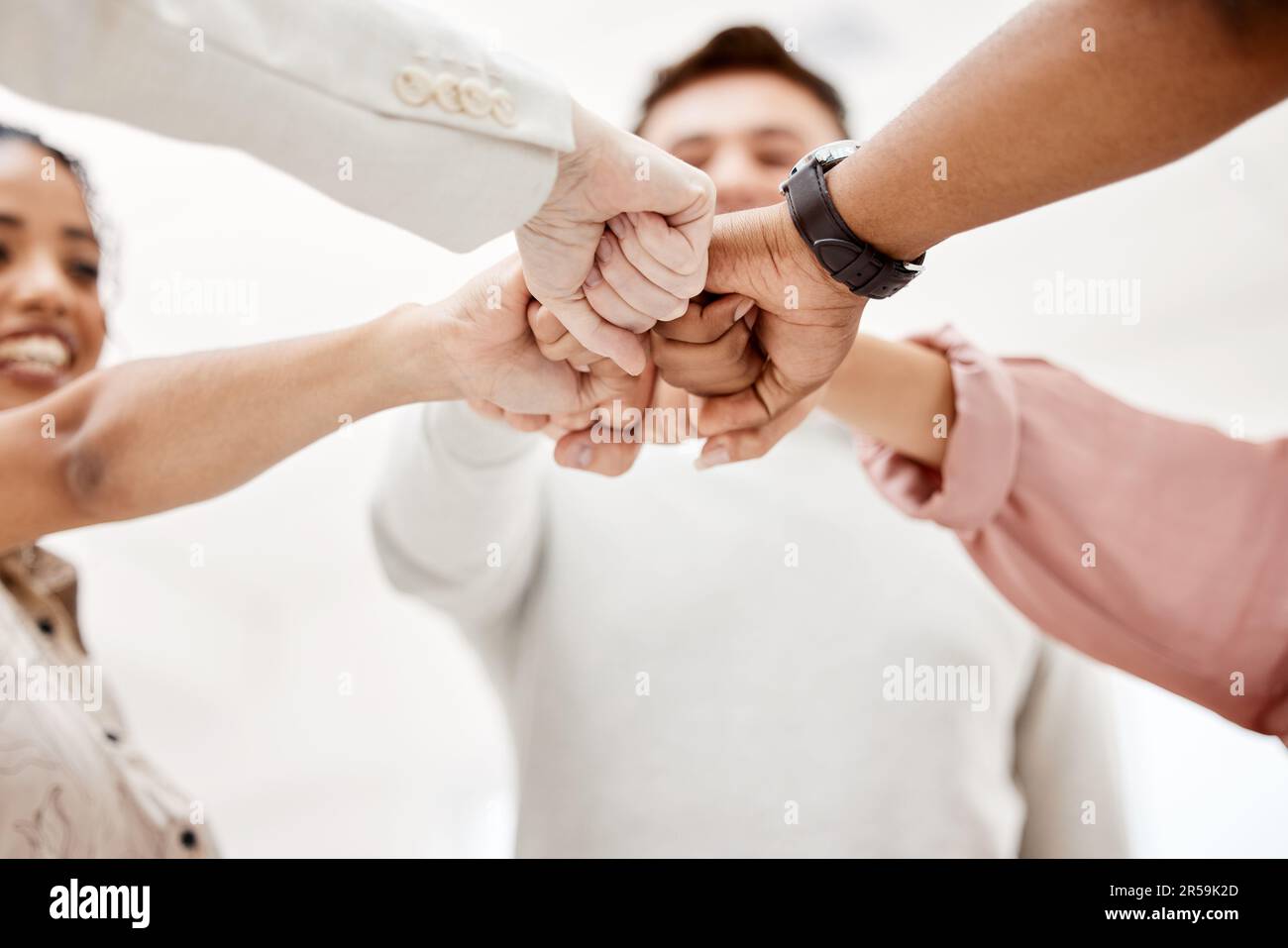 Fist bump, support and group of people for teamwork, challenge and ...