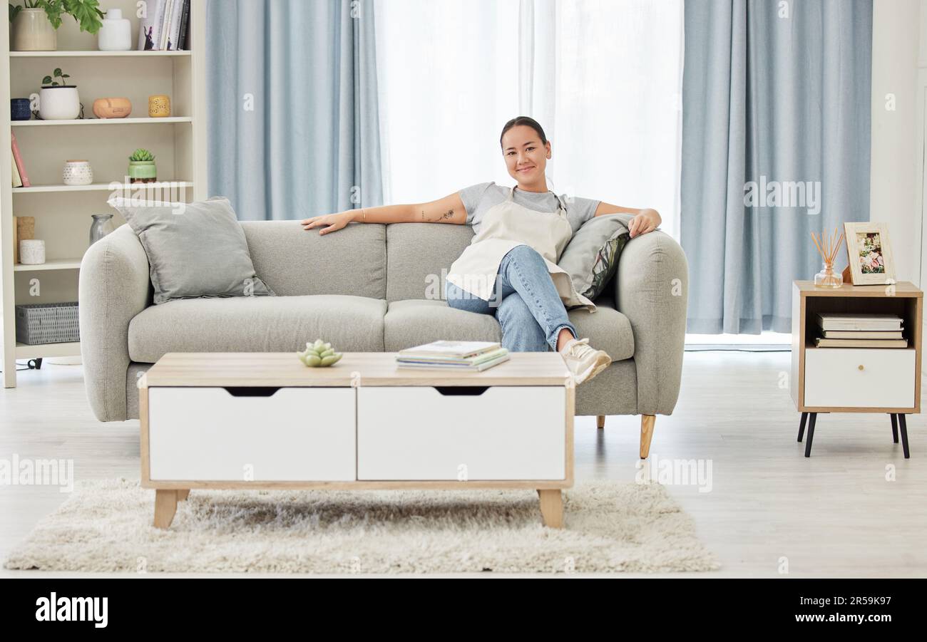 Woman relaxing while maid work house hi-res stock photography and ...