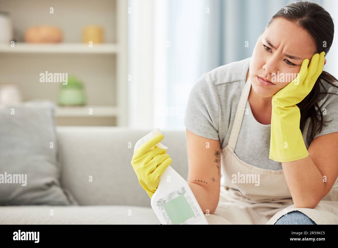 Product, maid and woman tired from cleaning furniture, counter and ...