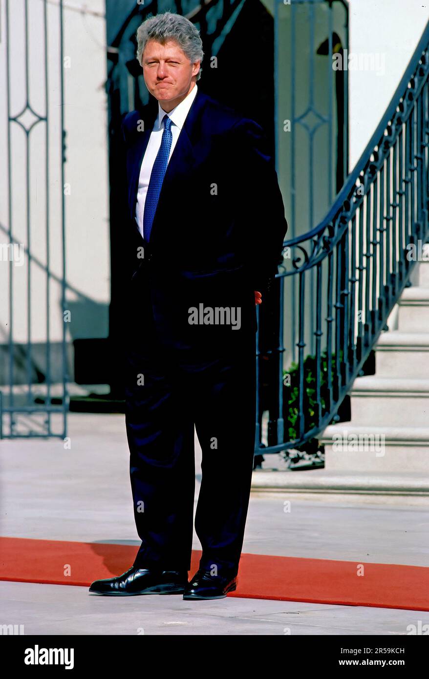 WASHINGTON DC - 1993President William (Bill) Clinton stands on red ...