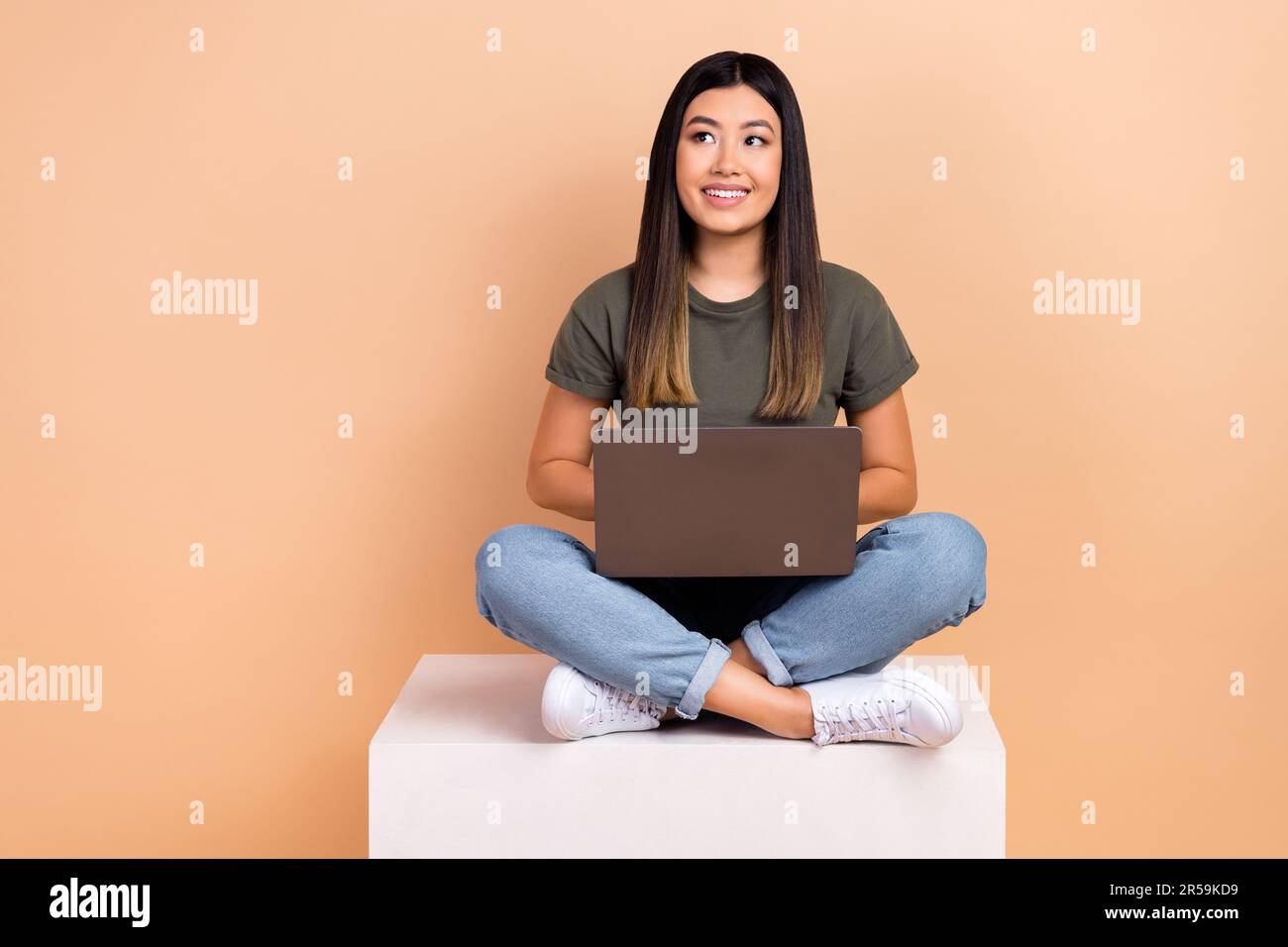 Full length photo cadre of young korean junior programmer woman sit box ...