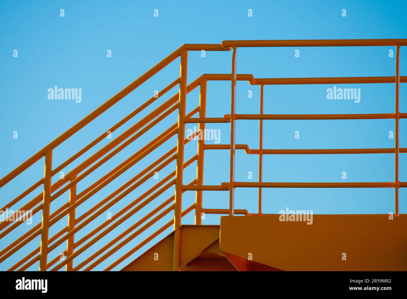 Yellow metal hand railings on a ferry Stock Photo - Alamy