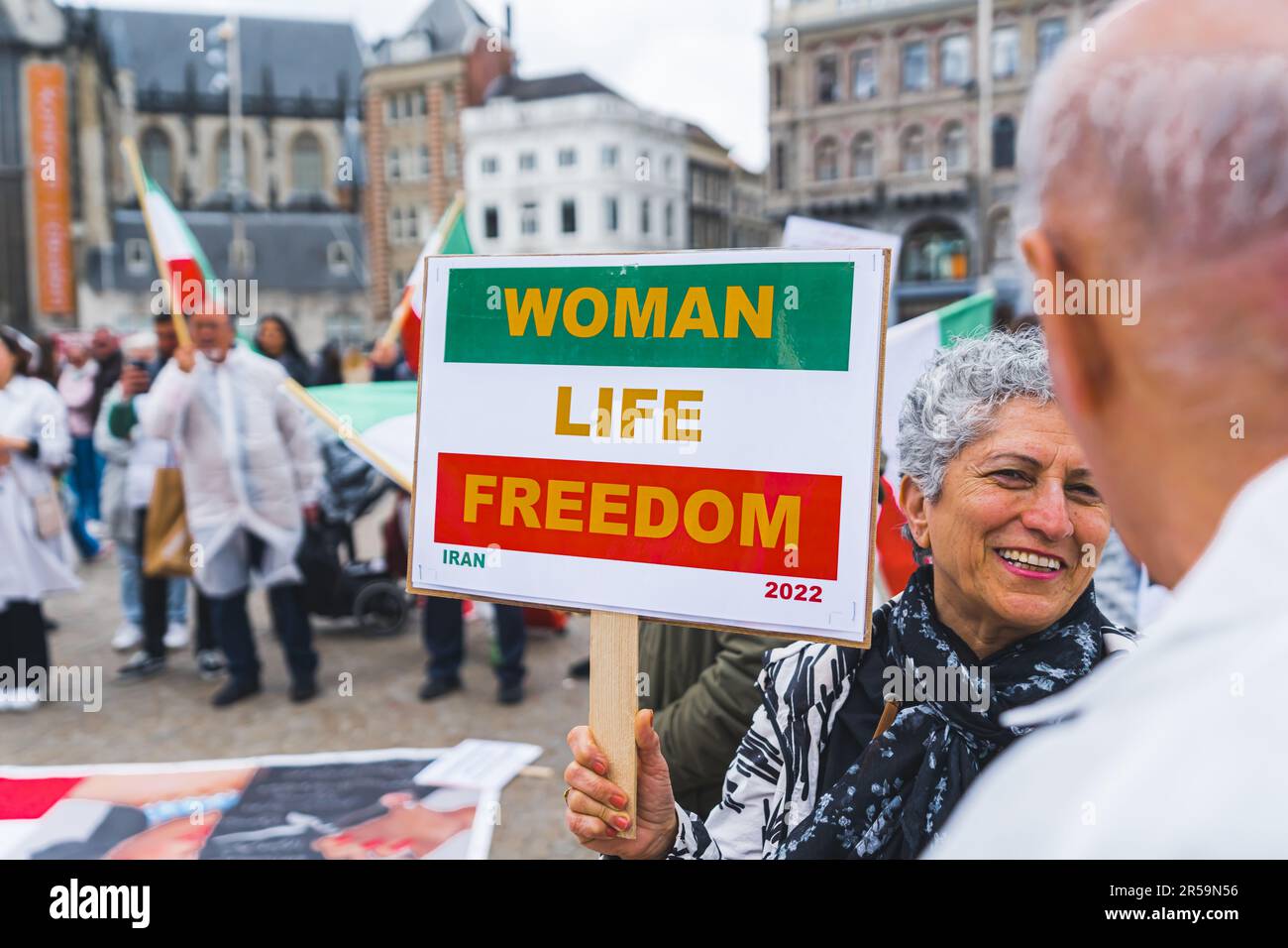 04.18.2023 Amsterdam, Netherlands. Positive short-haired female ...