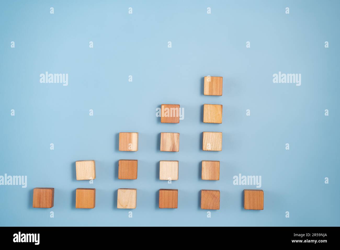 blank wooden cubes in a pyramid shades ranging from dark to light beige ...