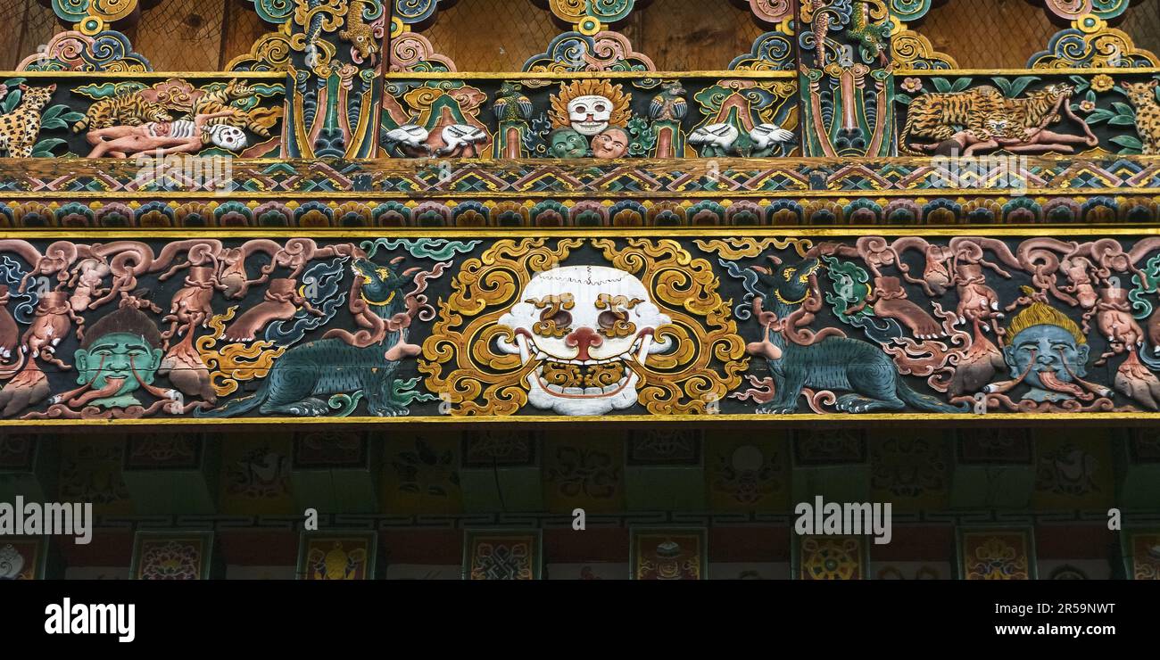 Intricate and colorful traditional wood carving representing ...