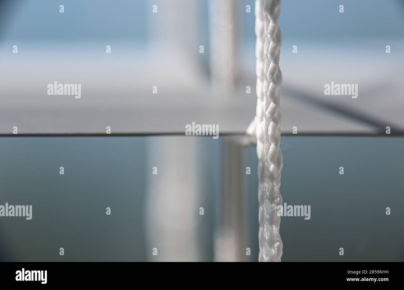 Detail of the string holding up binds in a window Stock Photo - Alamy
