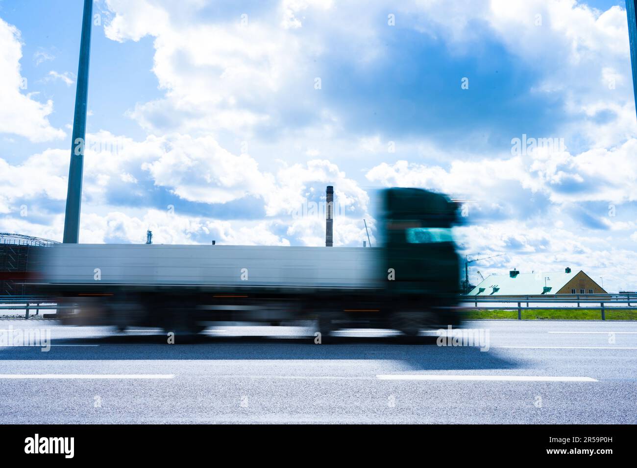 Lorry passing at high speed Stock Photo - Alamy