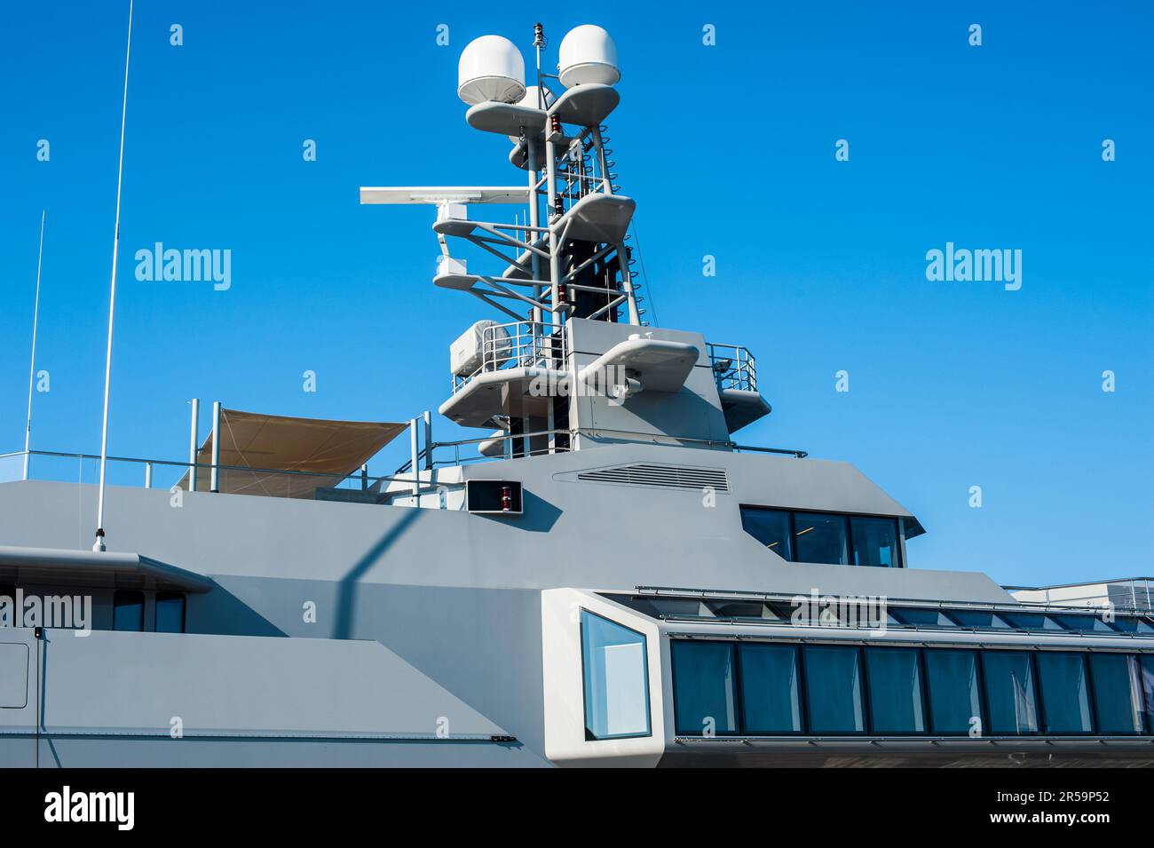 Side bridge and mast of a large grey yacht Stock Photo - Alamy