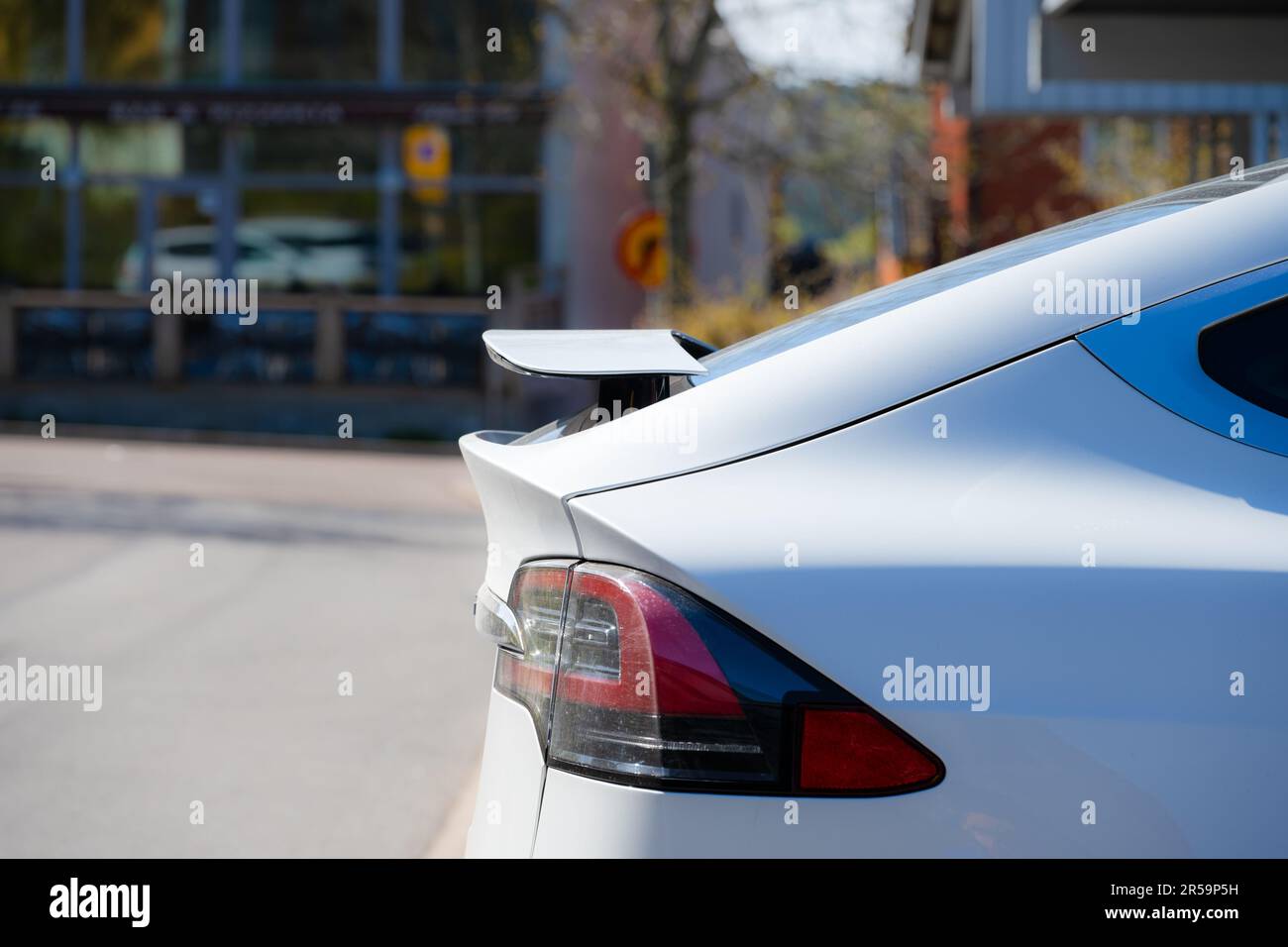 Rear wing of a white aerodynamic car Stock Photo - Alamy