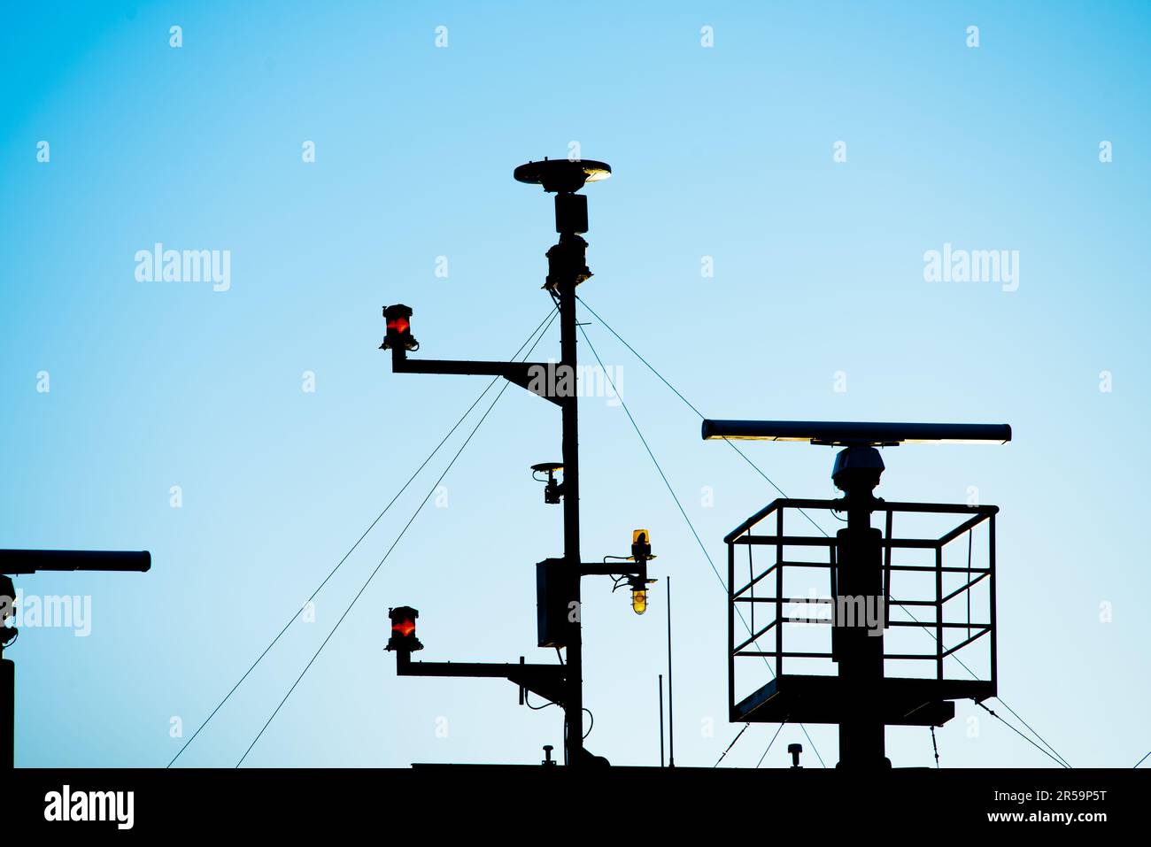 Radar antennae and lanterns on top of a ferry Stock Photo - Alamy