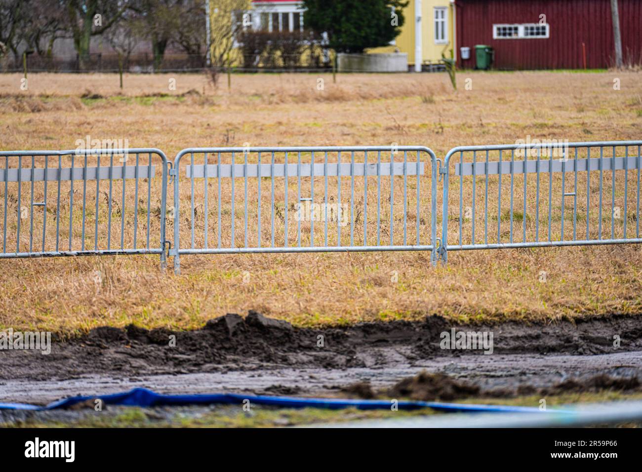 Temporary metal fence blocking off at a construction site Stock Photo ...