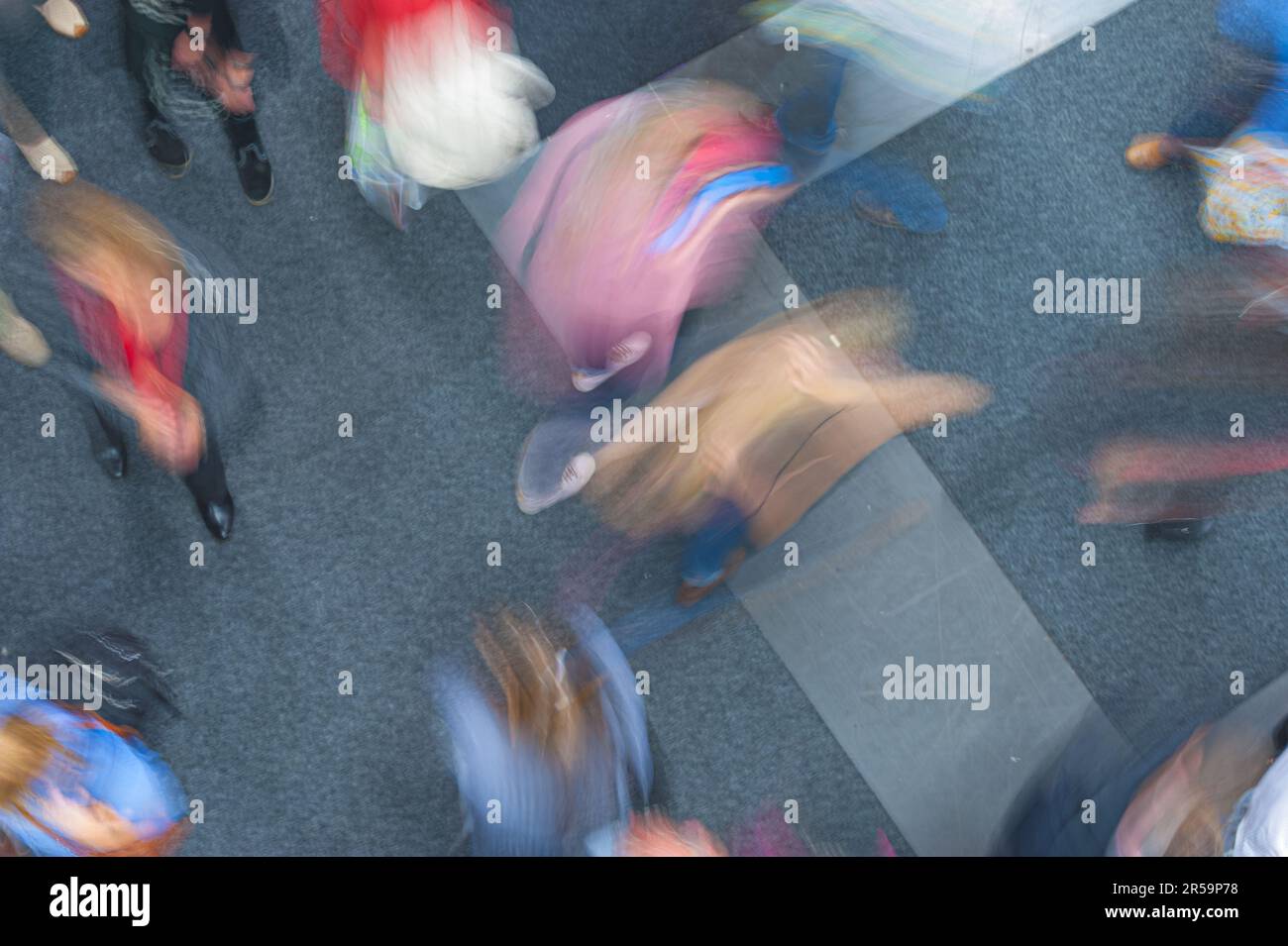 People moving around the floor of a book fair Stock Photo - Alamy