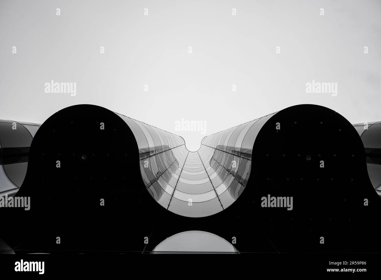 Wave formed glass facade of an office building Stock Photo - Alamy