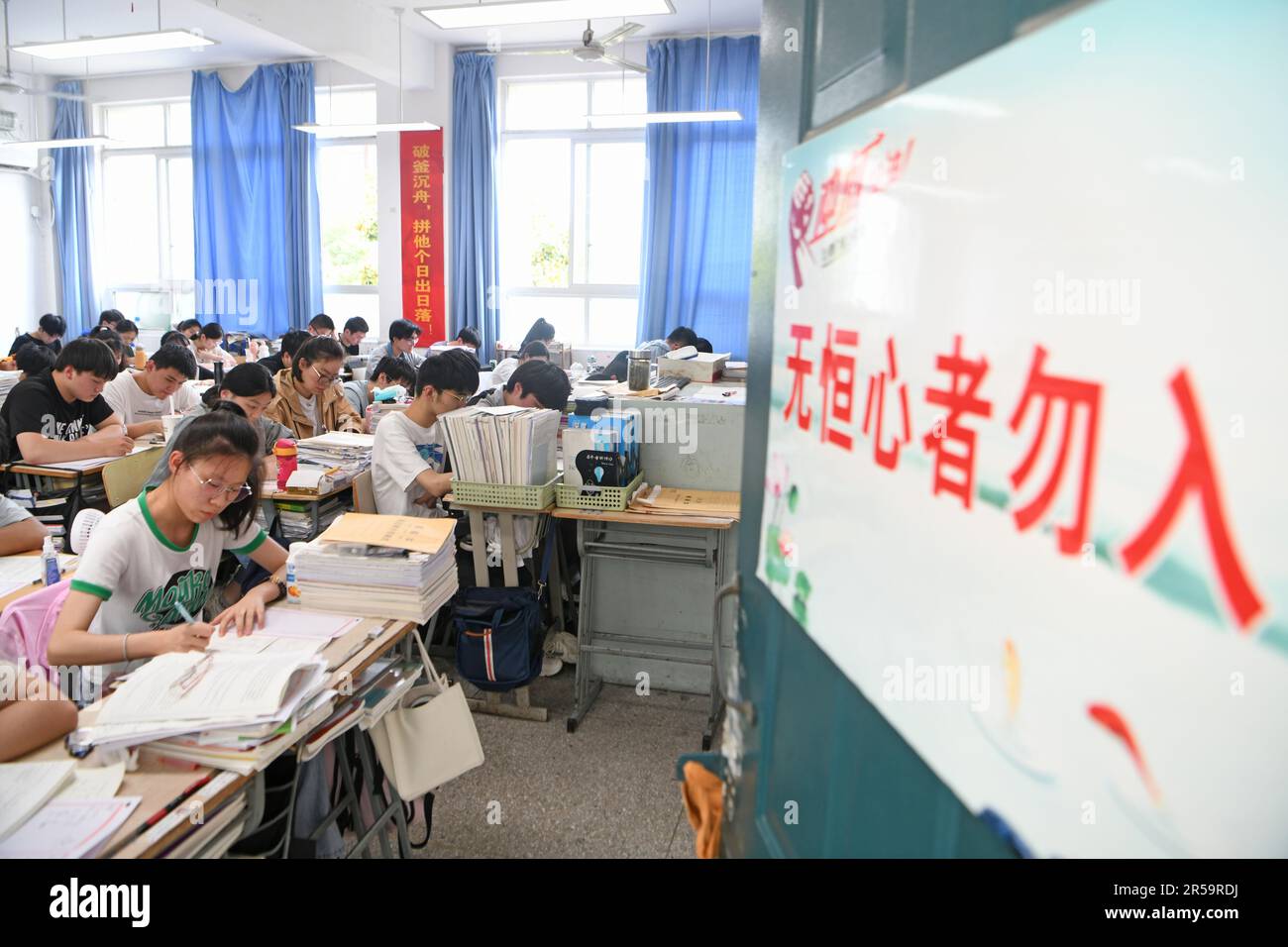 Senior high school students study hard for the national college ...