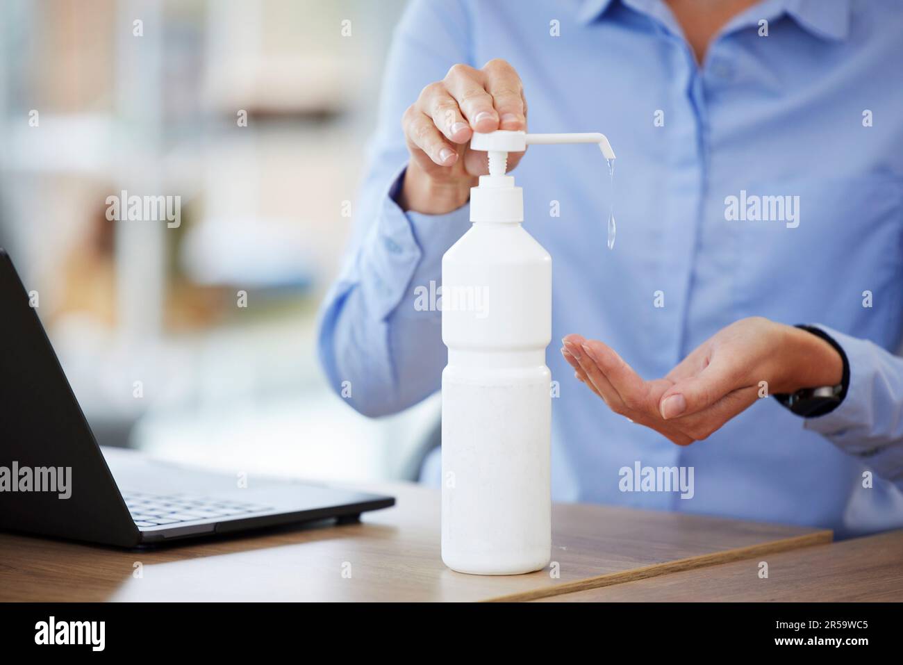 Hands, sanitizer and cleaning in office for health, safety and wellness ...