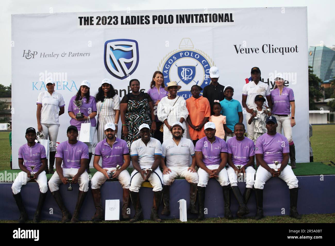 Polo players pose for a group photograph with officials during the ...