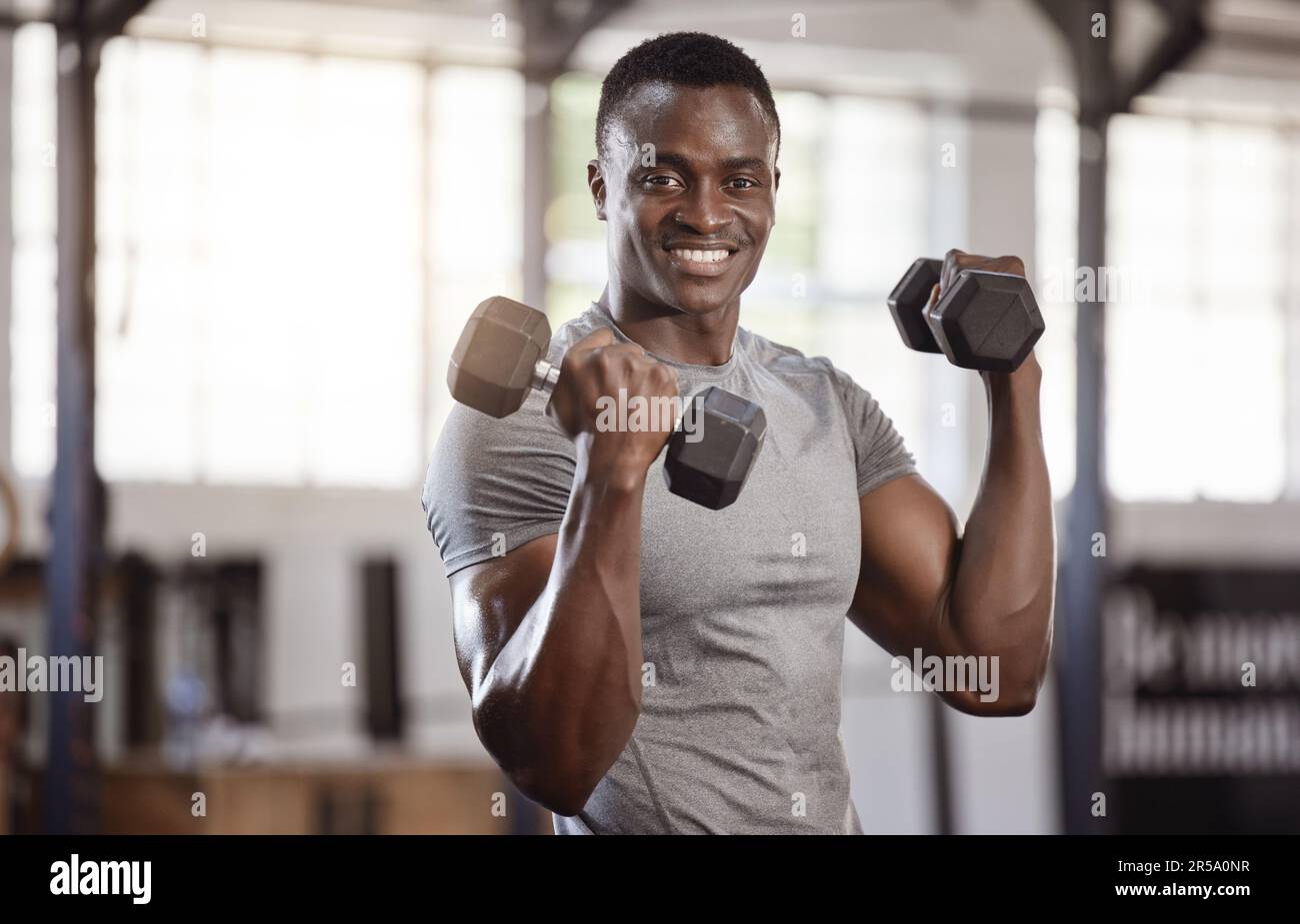 Exercise, dumbbells and portrait of a black man at gym for fitness ...