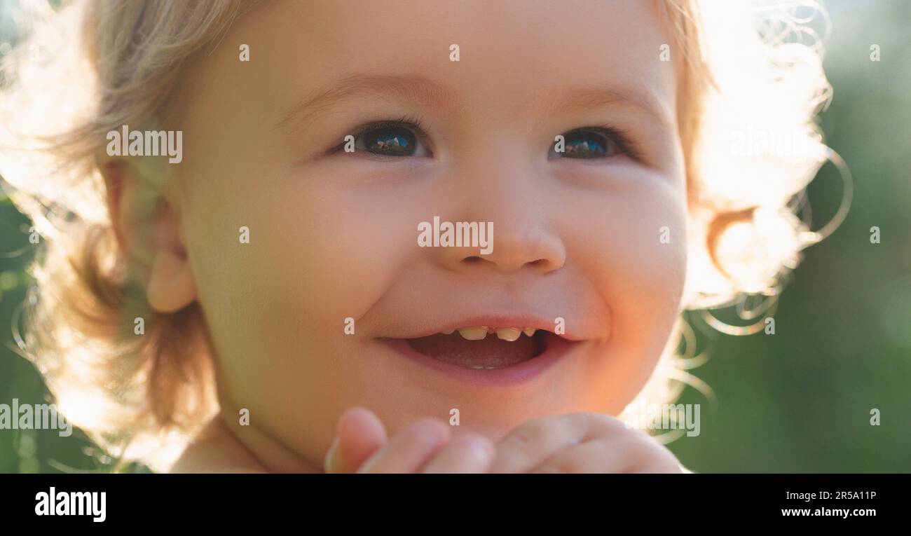 Kids portrait, close up head of cute child. Baby smiling, cute smile on ...