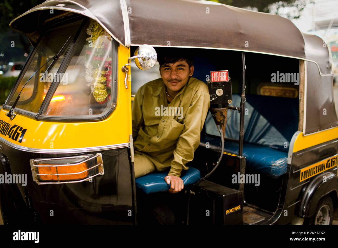 Auto rickshaw driver at Chhatrapati Shivaji International Airport, Mumbai, India Stock Photo - Alamy